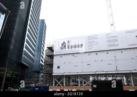 22 Ropemaker Street office building under construction site hoarding ...