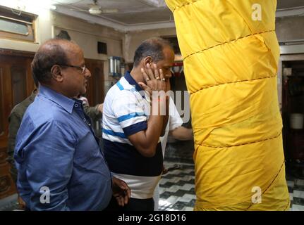 An Indian family offer prayers to a 130-year-old Neem tree on World ...
