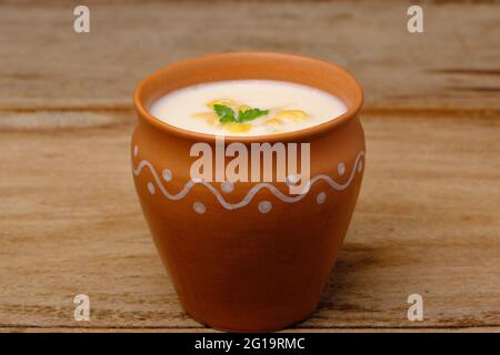 Indian style summer drink masala chach or raita made from buttermilk ...