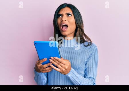 Angry transgender person shouting using a loudspeaker Stock Photo - Alamy