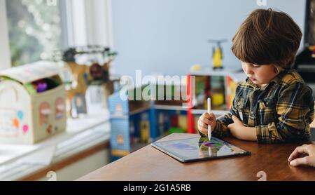 Kids learning to draw with graphic tablet and stylus pen Stock Photo ...