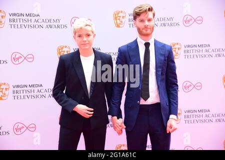 Mae Martin (left) and Joe Hampson arrive for the Virgin Media BAFTA TV ...