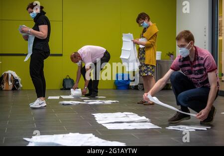 Election workers start counting ballots following parliamentary ...