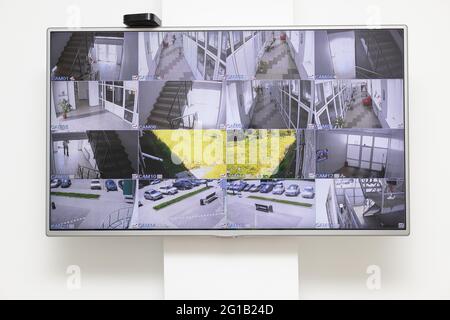 Multiple security surveillance CCTV video cameras monitoring Singapore ...
