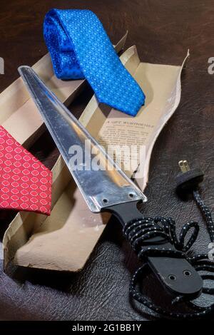 Vintage necktie iron with cloth cord, USA Stock Photo - Alamy