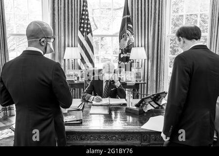 President Joe Biden and Director of Oval Office Operations Annie ...