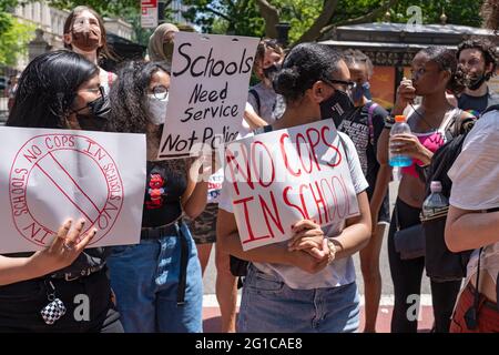 Police officers from the Protester Removal Team work to free a Just ...