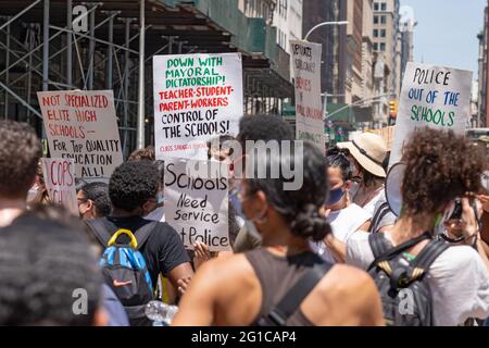 Police officers from the Protester Removal Team work to free a Just ...