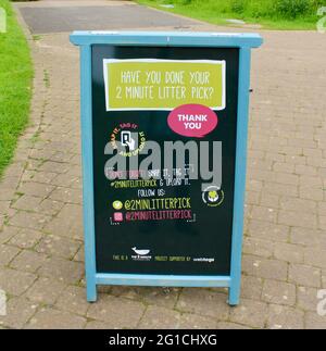 Litter picking sign board encouraging people to help keep Britain tidy ...