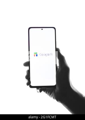 Google Fi Wireless logo of app on the screen of mobile phone held by ...