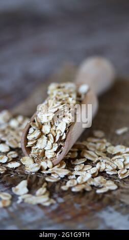 Oatmeal in a wooden spatula Stock Photo - Alamy