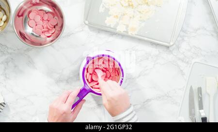 Flat lay. Step by step. Melting white chocolate chips in the cooking ...