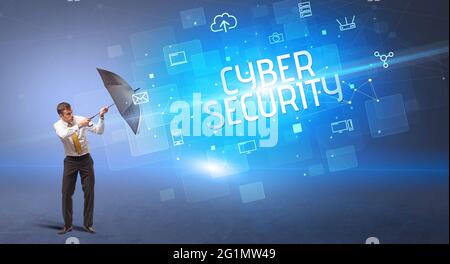 defending with umbrella from cyber attack Stock Photo - Alamy