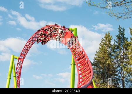 Amusement trolley makes circle loop turns upside down, roller coaster ...