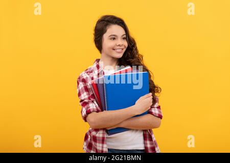 nerd. happy childhood. cheerful kid going to do homework with books ...