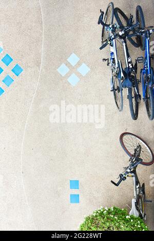 Bird eye view of bicycles parked on the ground Stock Photo - Alamy