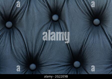 Black genuine leather sofa pattern as background image Stock Photo - Alamy