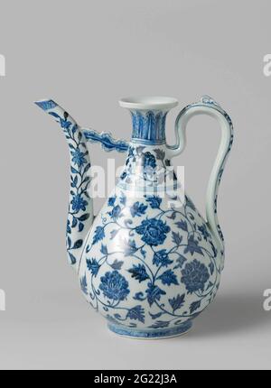 This ceramic ewer, used for pouring liquids, features intricate ...