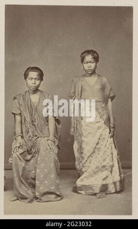 Two Javanese girls, Studio portrait of two Javanese girls. Pasted-in ...
