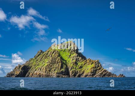 Tour boats docking to Skellig Michael island with monks hermitage on ...