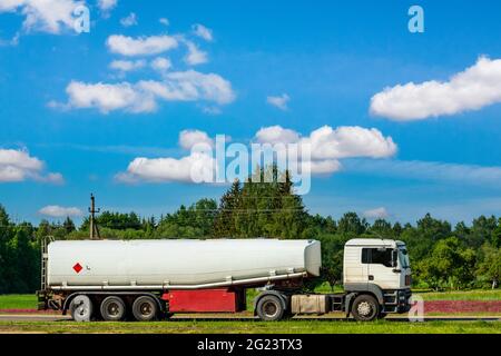 Heavy transport speeding on highway Stock Photo - Alamy