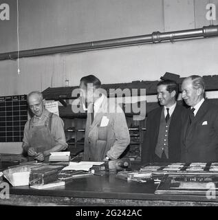 1960s, historical, company directors on the factory floor where workers ...