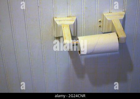 White Toliet Paper Holder with Roll Stock Photo - Alamy