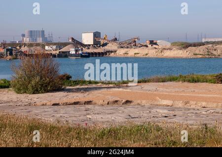 Looking across CEMEX Denge Quarry gravel pit at Dungeness, Kent ...