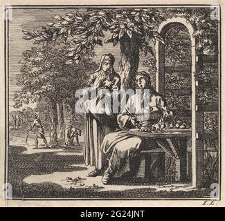 Man shows different nuts to a woman; The nut Stock Photo - Alamy