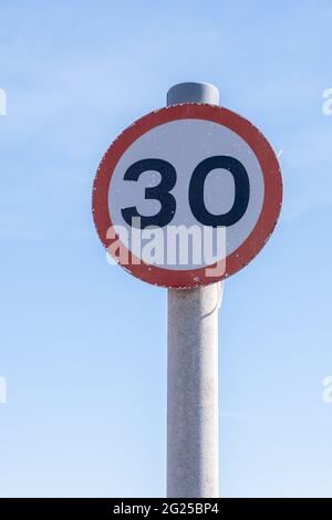 30mph speed limit sign in built up area with Watch Your Speed message ...
