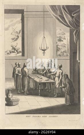 Jewish family celebrating Passover at the table with traditional food ...