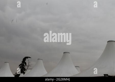 inverted funnel shaped tents and sky Stock Photo - Alamy