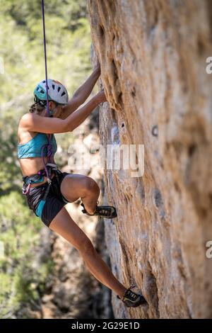 pretty girl climbing on a sunny day Stock Photo - Alamy