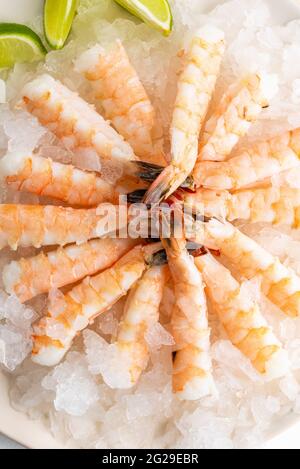 ingredients for sushi, fish, herbs, shrimp, sauce, lime, tobiko caviar ...