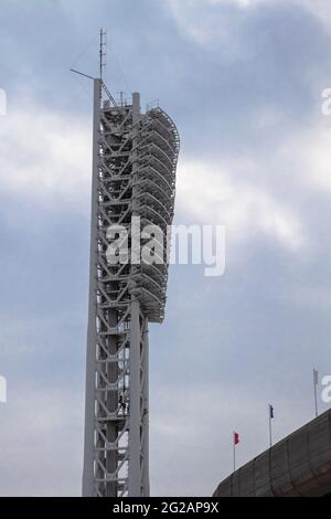 Football stadium floodlights against blue sky Stock Photo - Alamy