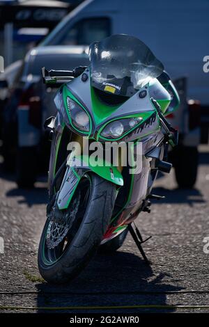 Lithuania 05-06-2021 Bright motorcycle sitting in a parking lot. Very clean machine, fine detail ...