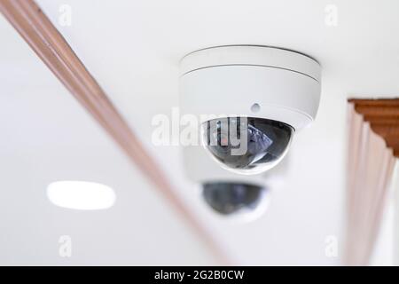 CCTV camera is installed inside the hospital building on the ceiling ...