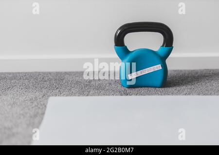 home gym and exercising in your spare time, dumbbell on yoga mat on ...