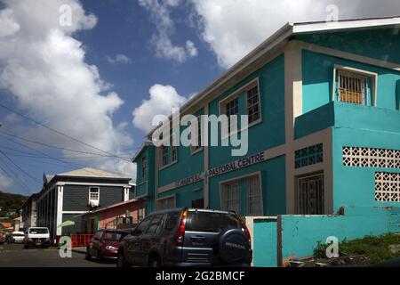 Victoria St Mark Grenada Street Scene Ambulance on Road and Cars Parked ...