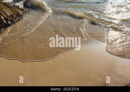 Heat at sea, waves glisten in the sun, beach vacation Stock Photo - Alamy