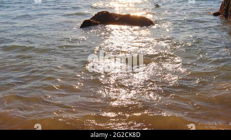 Heat at sea, waves glisten in the sun, beach vacation Stock Photo - Alamy