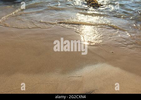 Heat at sea, waves glisten in the sun, beach vacation Stock Photo - Alamy