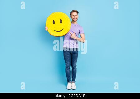 Photo of positive cheerful person indicate finger empty space promo ...