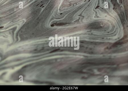 Pollen in a puddle. Beautiful stains in the water. Brownian motion of ...