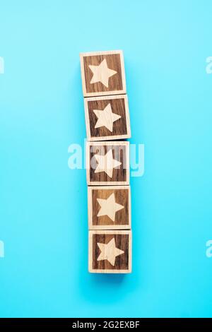 star symbol block on blue background. Service rating, ranking, customer ...