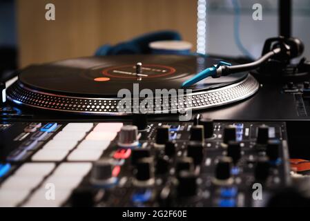Professional dj equipment setup with vinyl turntable and headphones ...