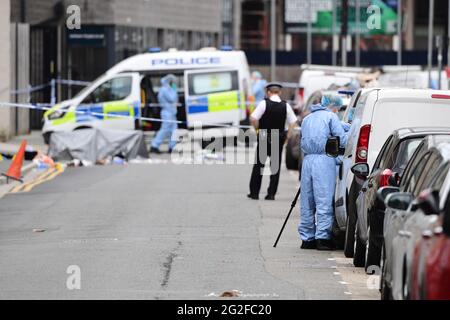 Police forensic officers on Blyth Road in Hayes, west London, where a ...