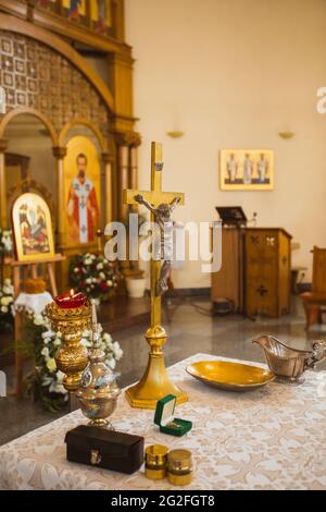 Altar at the church with ceremonial objects for Baptism Stock Photo - Alamy