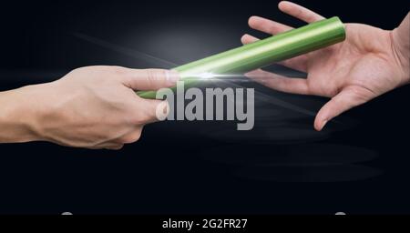 Composition of caucasian athletes passing green relay baton with ...