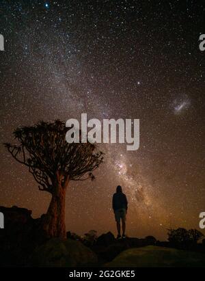 Lighting the night sky in namibia Stock Photo - Alamy